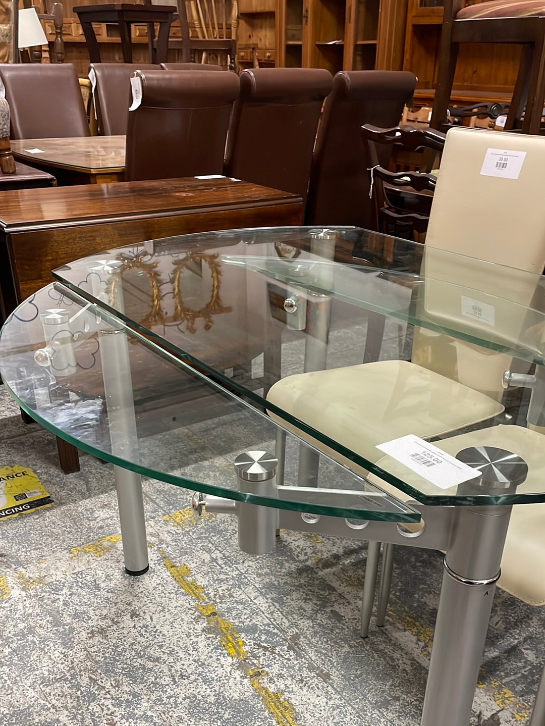 Circular extendable glass and chrome kitchen table – CJM Furniture