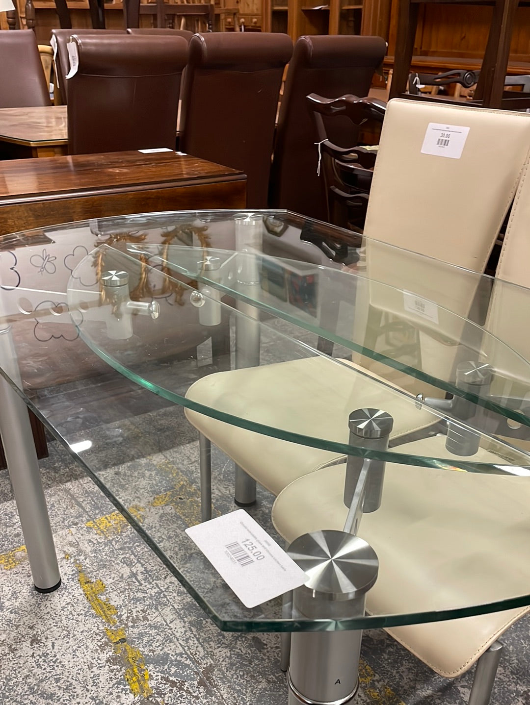 Circular extendable glass and chrome kitchen table – CJM Furniture
