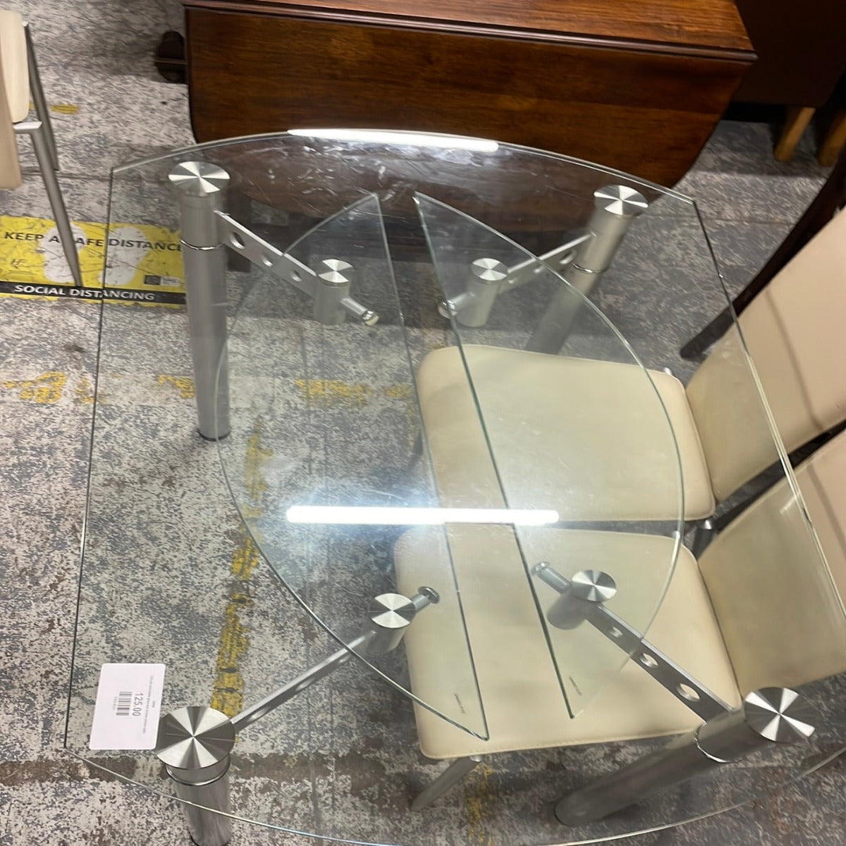 Circular extendable glass and chrome kitchen table – CJM Furniture